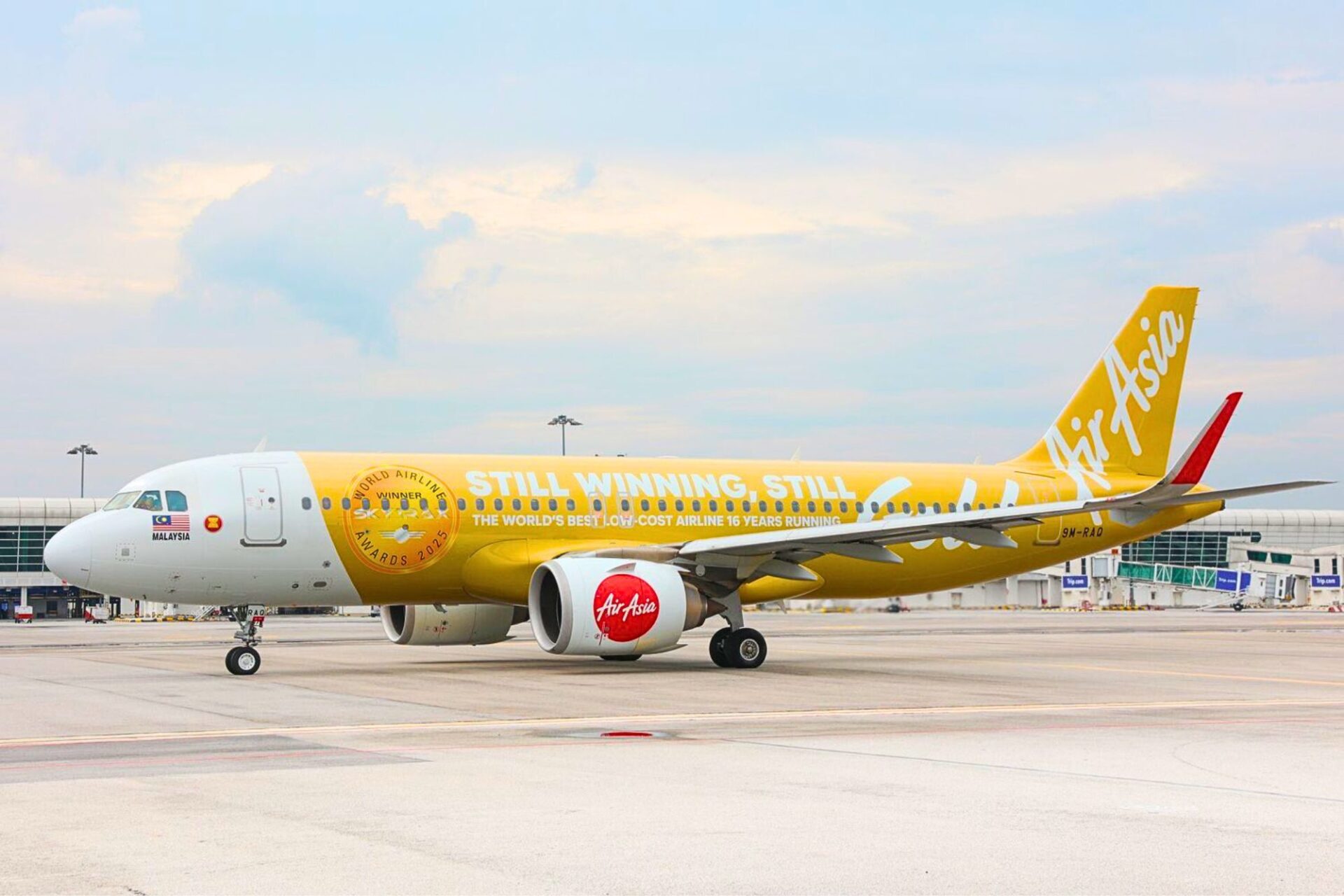 AirAsia unveils striking gold livery after 16th Skytrax win - AeroTime