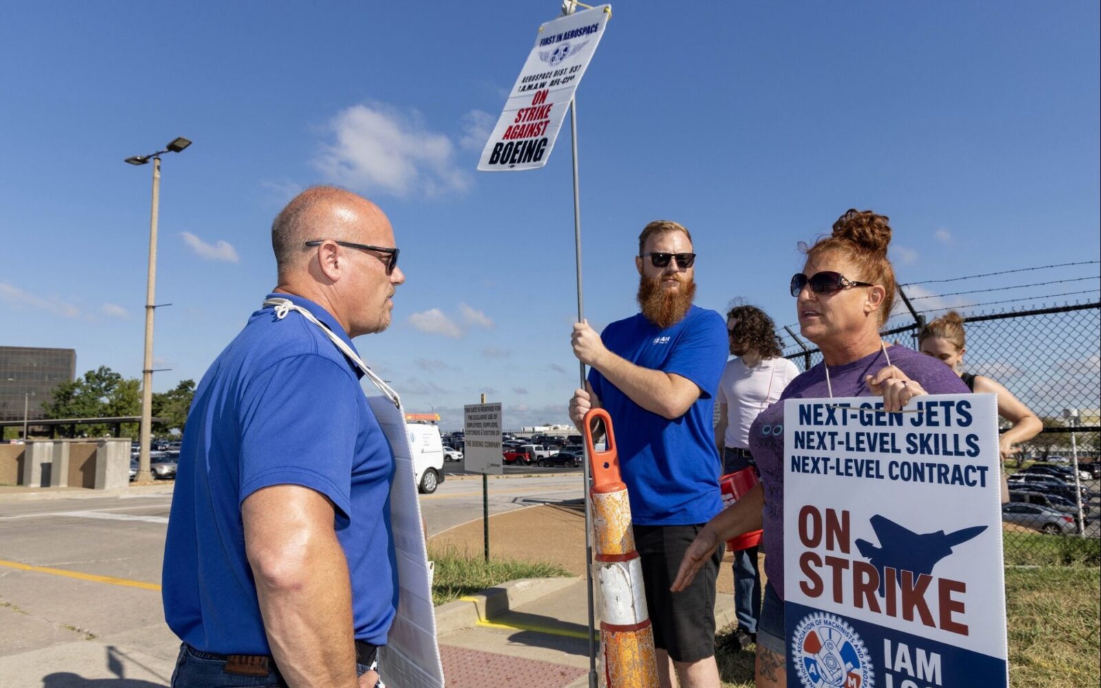 Striking defense workers reach tentative deal with Boeing