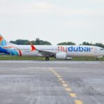 PAX opened aircraft hatch and jumped off wing to escape cops