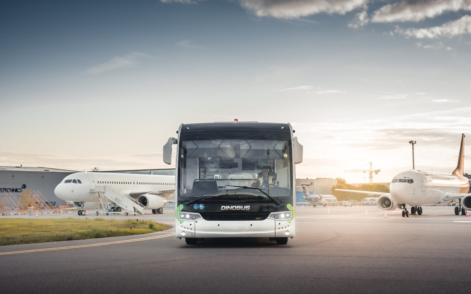 DINOBUS: Sustainable ground transport, one EV bus at a time