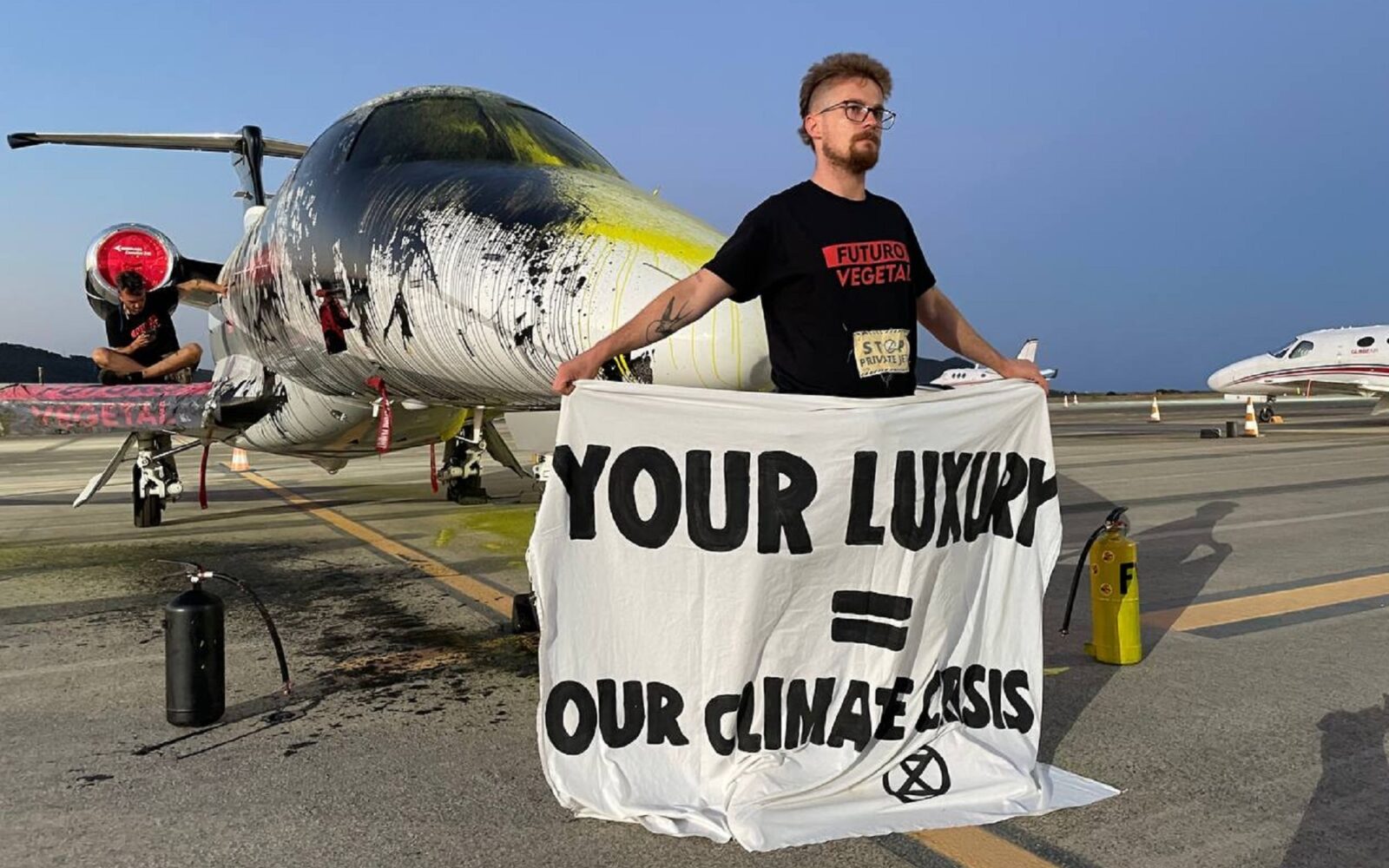 Protestors deface private jet in a cocktail of paint: video