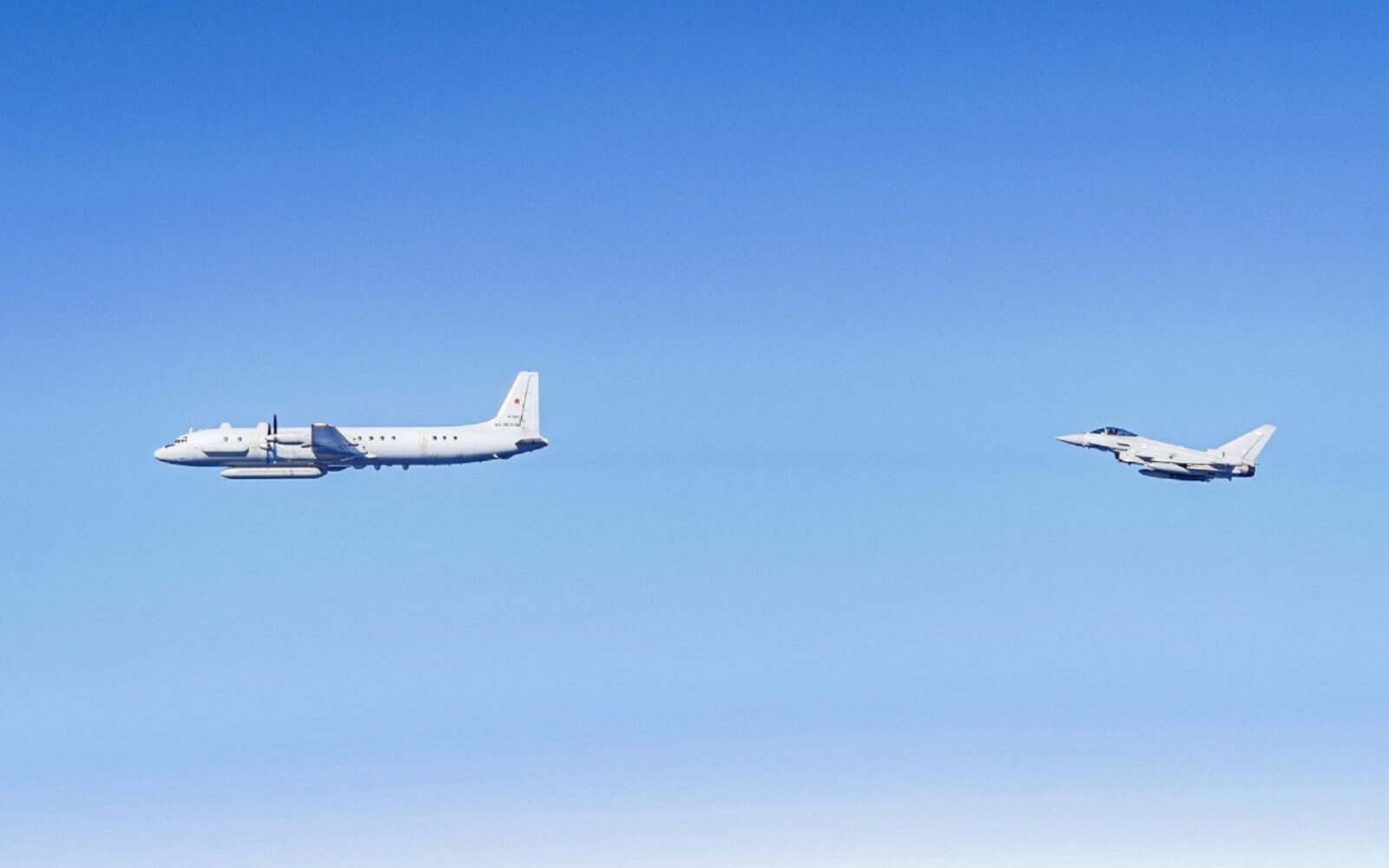 RAF and German jets intercept Russian Su-27s and spy plane