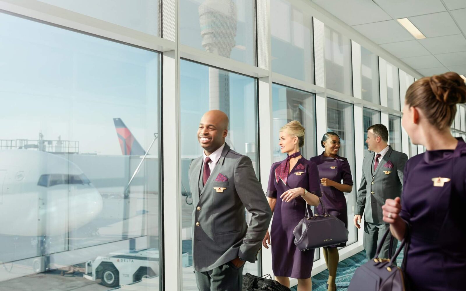Top 10 most iconic cabin crew uniforms throughout the years - AeroTime
