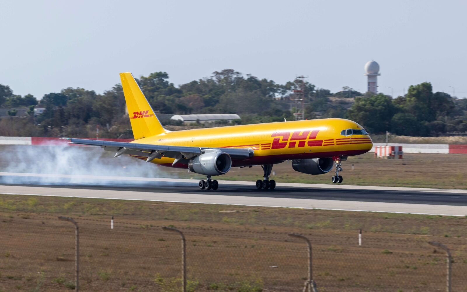 DHL Boeing 757 freighter tail breaks off after skidding off runway ...