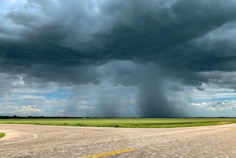 What is a microburst and how do pilots respond to them?